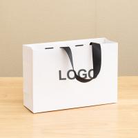 China Custom Matte Black Paper Bags with Logo for Boutique Retail 30x20x10cm for sale