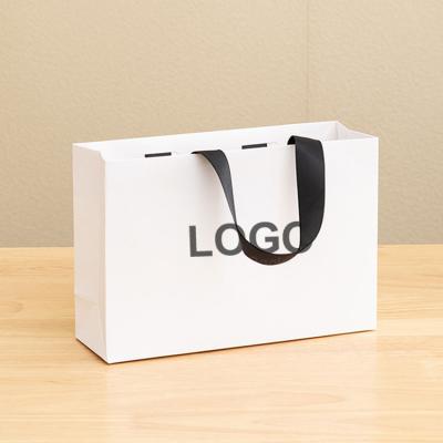 China Custom Matte Black Paper Bags with Logo for Boutique Retail 30x20x10cm for sale