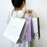 China Custom Matte Black Paper Bags with Logo for Boutique Retail 30x20x10cm for sale