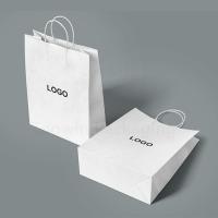 China Customized White Paper Bags with Black Handle 32x22x10cm for Grocery Store for sale