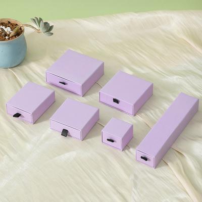 China Custom Jewelry Box Bracelet Case Display Luxury Storage Travel Resin Accessories Watch Drawer Gift Paper Box 9x7x3cm for sale