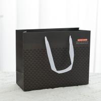 China Custom Pink 250G Kraft Paper Gift Bags with Three-Strand Rope Handles Matte Gold Logo for sale