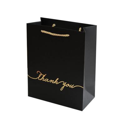 China Custom Kraft Paper Bags with Twisted Handles 14x10x15 Inches for Clothing Retail for sale
