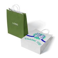 China Custom Kraft Paper Bags with Logo in Multiple Colors 30x40cm Durable Retail Packaging for sale