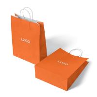 China Custom Kraft Paper Bags with Logo in Multiple Colors 30x40cm Durable Retail Packaging for sale