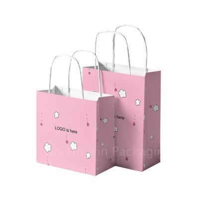 China Custom Kraft Paper Shopping Bags with Twisted String Handles Offset Printing 300gsm for sale