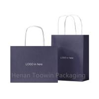 China Custom Kraft Paper Shopping Bags with Twisted String Handles Offset Printing 300gsm for sale