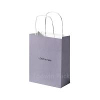 China Custom Kraft Paper Gift Bags with Personalized Print and Custom Color for Retail Stores for sale