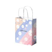 China Custom Kraft Paper Gift Bags with Personalized Print and Custom Color for Retail Stores for sale