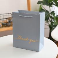 China Custom Kraft Paper Gift Bags with Logo 3-5 Days Delivery for Retail Stores for sale