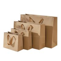 China Toowin Custom Kraft Paper Shopping Bag with Flat Handle for Perfume Retail 300gsm for sale