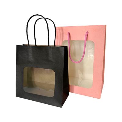 China Custom Kraft Paper Shopping Bags with Handles Wholesale Eco Friendly Paper Bags 300gsm for sale