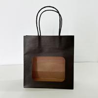 China Custom Kraft Paper Shopping Bags with Handles Wholesale Eco Friendly Paper Bags 300gsm for sale