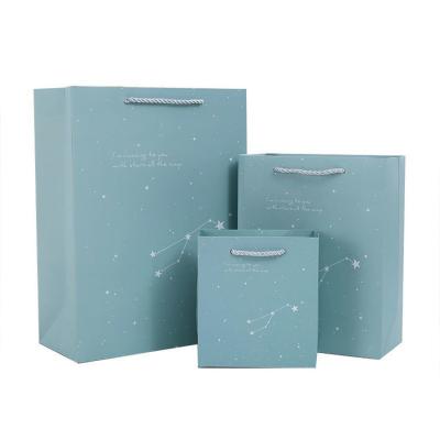 China Custom Kraft Paper Shopping Bag for Boutique Retail Gift Packaging with Logo Printing for sale