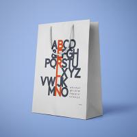 China Custom Yellow Kraft Paper Shopping Bags 250gsm Reusable Medium for Retail Clothing Gifts for sale