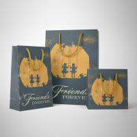 China Custom Kraft Paper Shopping Bag with Bright Film Surface and Hand Length Handle 30x40x10cm for sale