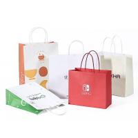 China Custom Kraft Paper Bags with Smooth Lamination and Three-Strand Rope Handles for Retail Stores for sale