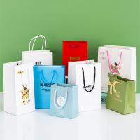 China Custom Eco-Friendly Offset Printing Food Paper Bags Glossy Lamination Ribbon Rope 300gsm Kraft for sale