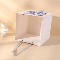 China Custom Brown Ribbon Handle Paper Bag for Clothing Recycled Kraft Paper 30x20x10cm for sale