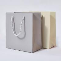 China Custom Kraft Paper Gift Bags with Handles 30x20x10cm for Retail Stores for sale