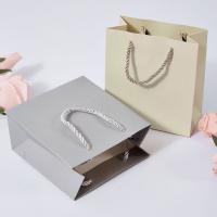 China Custom Kraft Paper Gift Bags with Handles 30x20x10cm for Retail Stores for sale