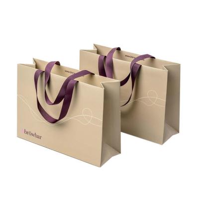 China Custom Logo Printed Ivory Board Paper Bags for Jewelry Clothing Packaging 300gsm for sale
