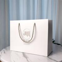China Custom Printed Hot Foil Stamping Logo Handheld Paper Bag for Clothing Promotion 300gsm for sale