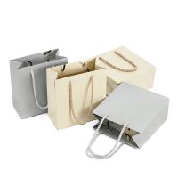 China Biodegradable Kraft Paper Bag with Gray Ribbon Handle for Clothing Store Custom Size for sale