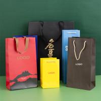 China Custom Kraft Paper Shopping Bag with Handles for Retail Cosmetics Gift Store 300gsm for sale
