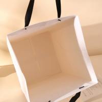 China Wholesale RPET Laminated Paper Shopping Bag Green Flower Design for Cosmetics Store Custom Size for sale