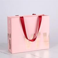 China Custom Kraft Paper Bags with Ribbon Handle Luxury Shopping Bags 300gsm for sale