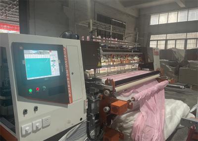 China High Precision Electric Computerized Quilting Machine With Automatic Feeding System for sale