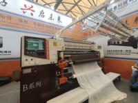 China New Yuxing Computer Multi Needle Rotary Hook Quilting Machine with 1600r/min High Speed and High Precision Screw Rod for sale