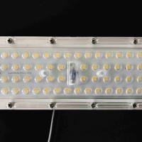 China 50W LED Street Light Module with 160lm/W Efficacy, SMD 3030 LEDs, 252x70mm PC Lens for Outdoor Lighting for sale