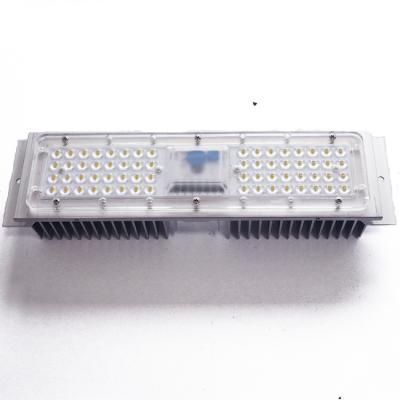 China AC 220V SMD 3030 LED Street Light Module 64-in-1 with Optical PC Lens and Heat Sink for sale