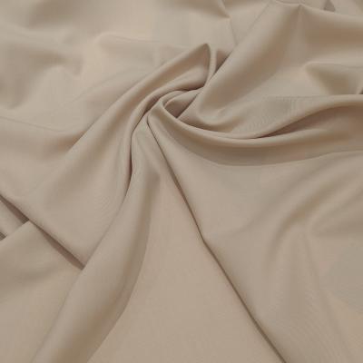 China 8311 100% polyester high-density woven fabric, wrinkle resistant, wear-resistant, not easy to deform, sagging, suitable for all seasons as raw materials for women's clothing for sale
