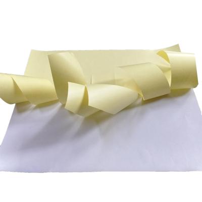 China HM0111 Sticker Paper - Cast Coated Art Paper with Yellow Silicone Kraft Backing for Professional Printing Applications for sale