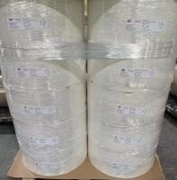 China HM1133H Semi Glossy Adhesive Label Material 80 GSM with Hotmelt Glue and Yellow Glassine Liner 58 GSM for sale