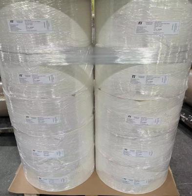 China HM1133H Semi Glossy Adhesive Label Material 80 GSM with Hotmelt Glue and Yellow Glassine Liner 58 GSM for sale