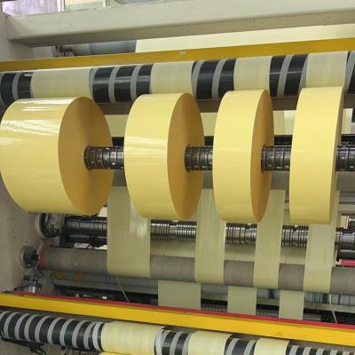 China 50μm Clear BOPP Top Coated Acrylic Glue Yellow Glassine Liner WG4533H - Industrial Adhesive Label Material for sale