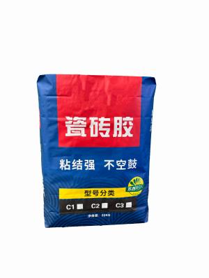 China Multi‑wall kraft paper tile‑adhesive bags with high tensile strength and tear resistance, support custom printing. for sale