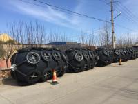 China 50Kpa 3.3*6.5m Black Marine Pneumatic Rubber Fenders With Tires for sale