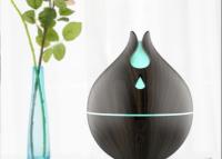 China 200ML Mini desktop USB Wood grain aromatherapy machine hollow humidifier for sale