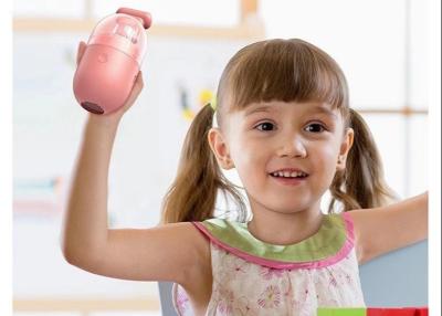 China 4w Crumbs Desktop Vacuum Cleaner MiNi Kids Handhold Cordless Rubber Capsule for sale