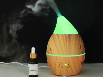 China 300ML Waterdrop Ultrasonic Essential Oil Diffuser 7 Led Color 50ml/h Wood Grain for sale