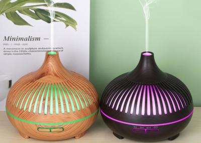 China 500ML Remote Control Hollow Wood Ultrasonic Aromatherapy Diffuser Humidifier With Bluetooth Stereo for sale