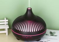 China 500ml Ultrasonic Hollow Wood Aroma Diffuser Cool Mist Humidifier With Bluetooth Speaker for sale