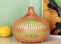 China 500ml Ultrasonic Hollow Wood Aroma Diffuser Cool Mist Humidifier With Bluetooth Speaker for sale