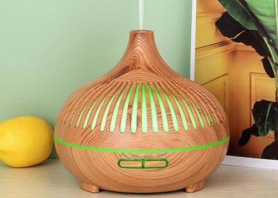 China 500ml Ultrasonic Hollow Wood Aroma Diffuser Cool Mist Humidifier With Bluetooth Speaker for sale