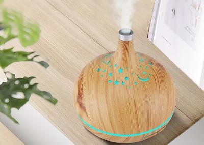 China 400ML Creative Wood Hollow Star Moon Aromatherapy Diffuser Humidifier for sale